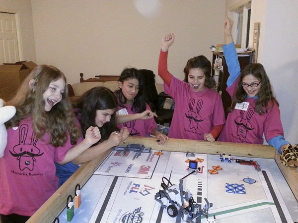 They’re not just selling cookies — Girl Scouts also building bridges ...