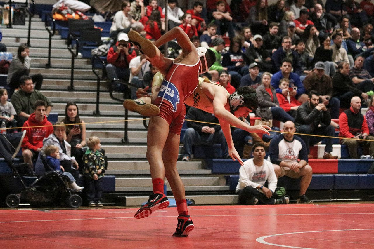 Redmond boys wrestling grabs 3A KingCo tourney title; Mustang girls win ...