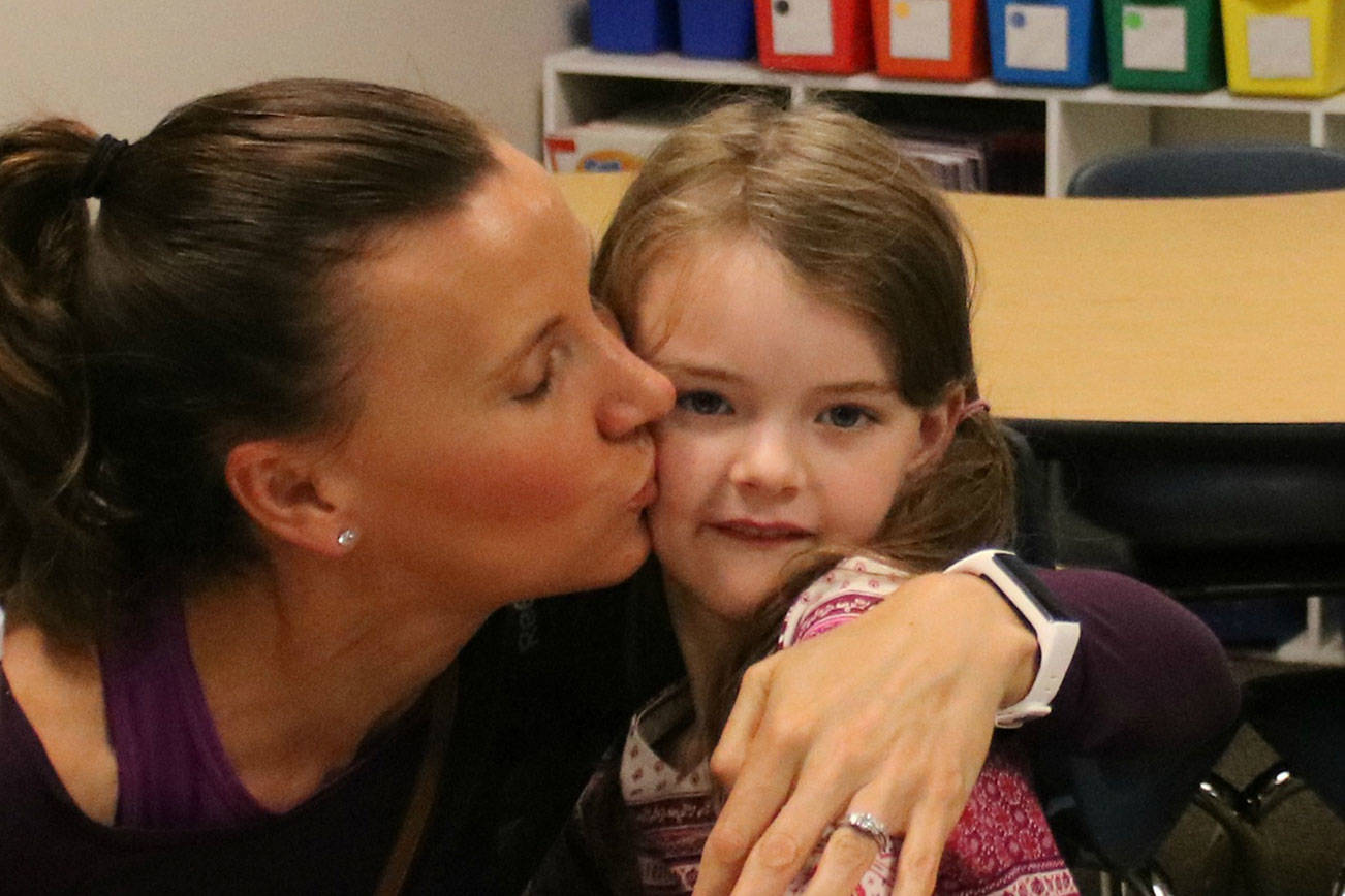 A kiss before class at Horace Mann Elementary | Redmond Reporter