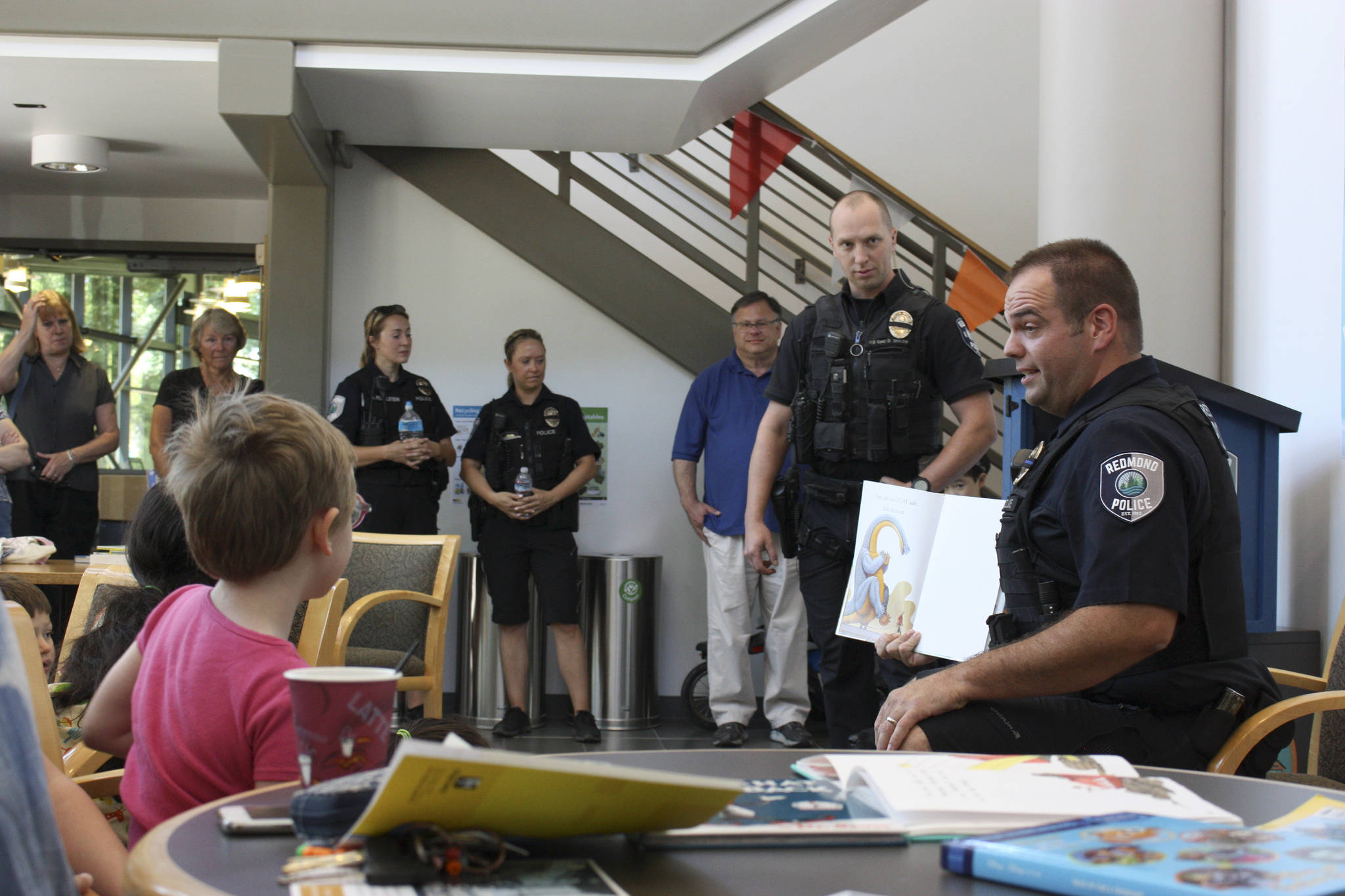 Redmond police promote literacy and safety at Little Library opening ...