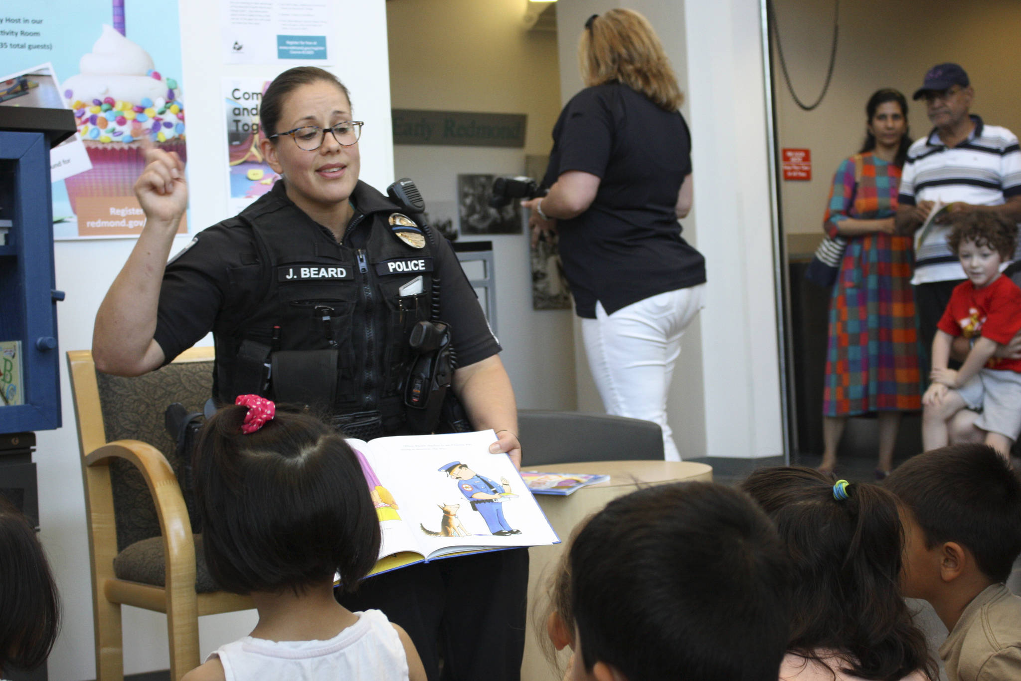 Redmond police promote literacy and safety at Little Library opening ...